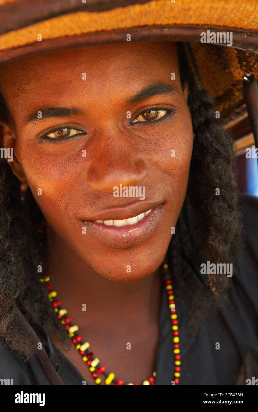 Niger. A Wodaabe-Bororo man with his face painted for the annual ...