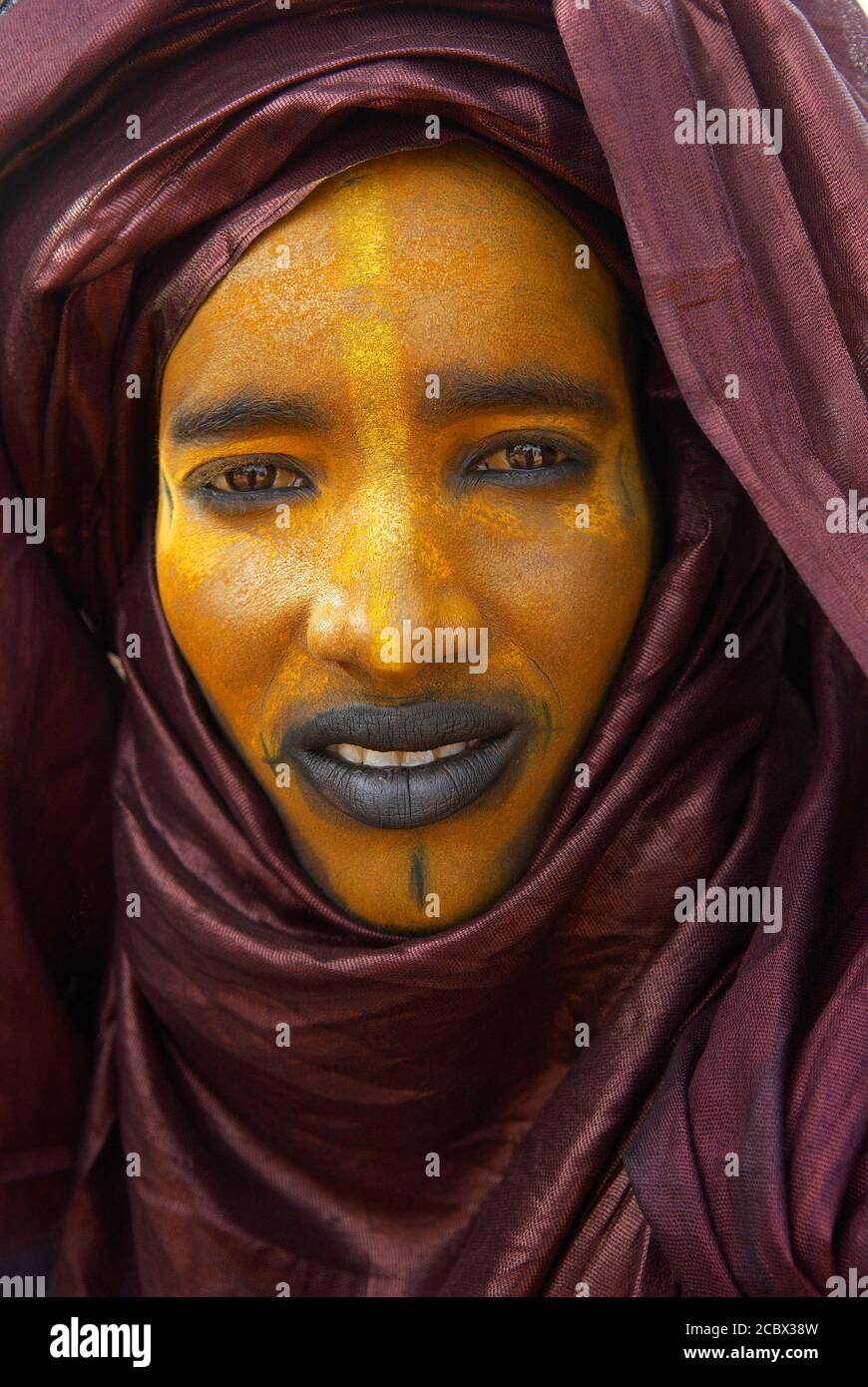 Niger. A Wodaabe-Bororo man with his face painted for the annual ...