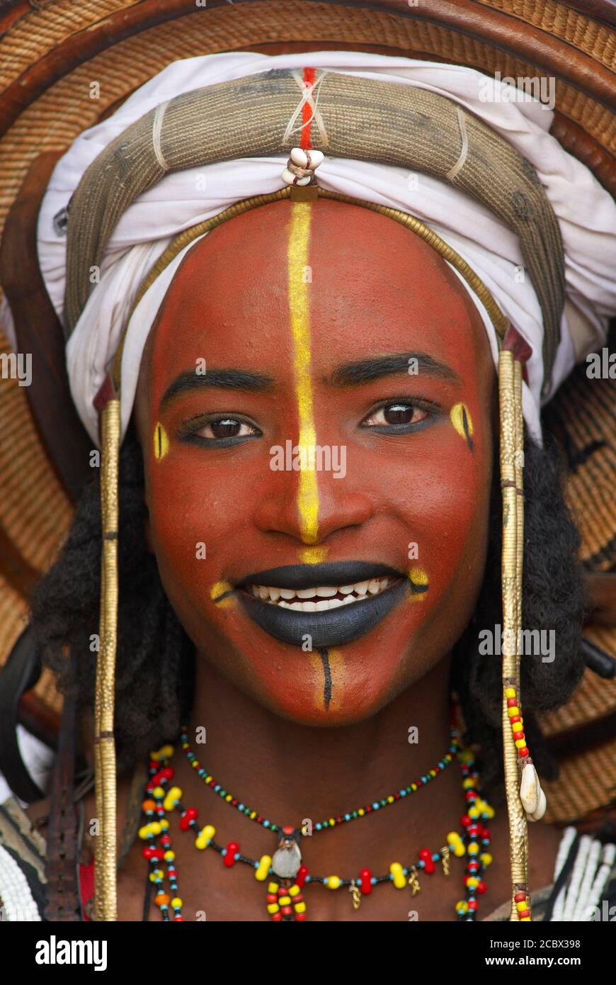 Niger. A Wodaabe-Bororo man with his face painted for the annual ...