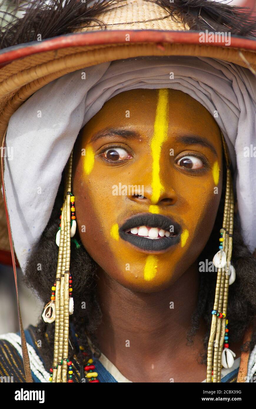 Niger. A Wodaabe-Bororo man with his face painted for the annual ...