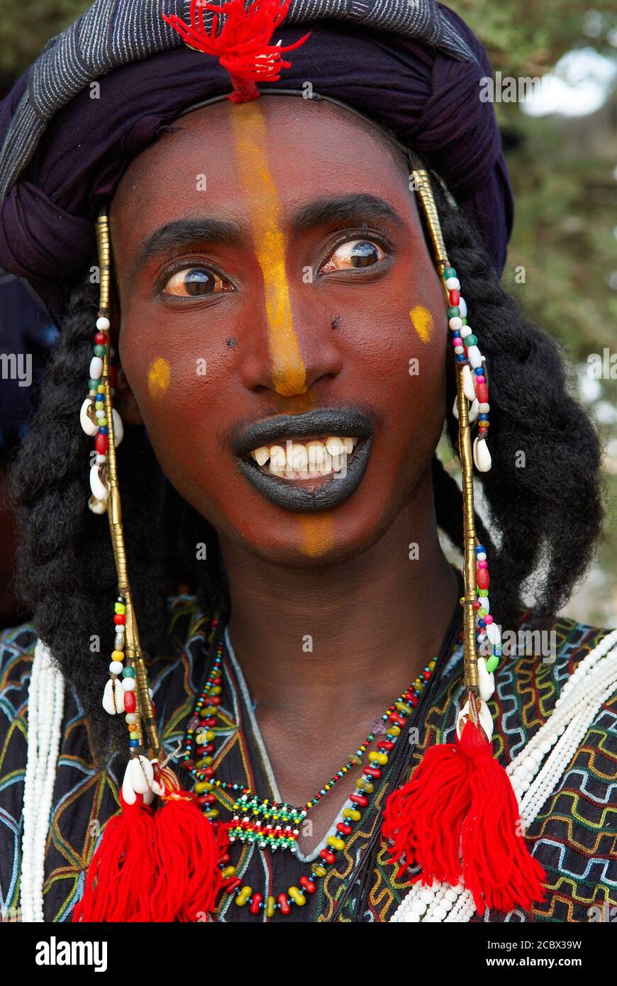 Niger. A Wodaabe-Bororo man with his face painted for the annual ...