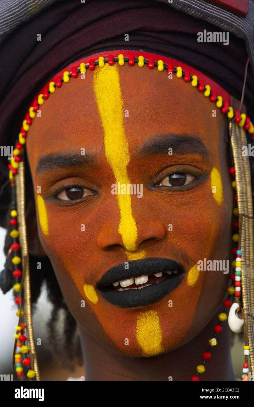 Niger. A Wodaabe-Bororo man with his face painted for the annual ...