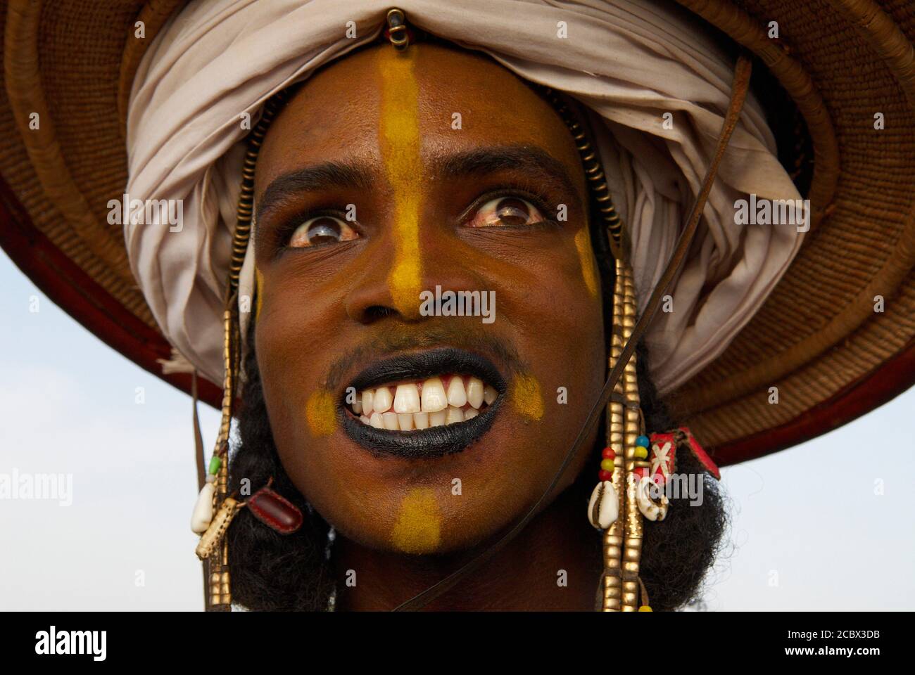 Niger. A Wodaabe-Bororo man with his face painted for the annual ...