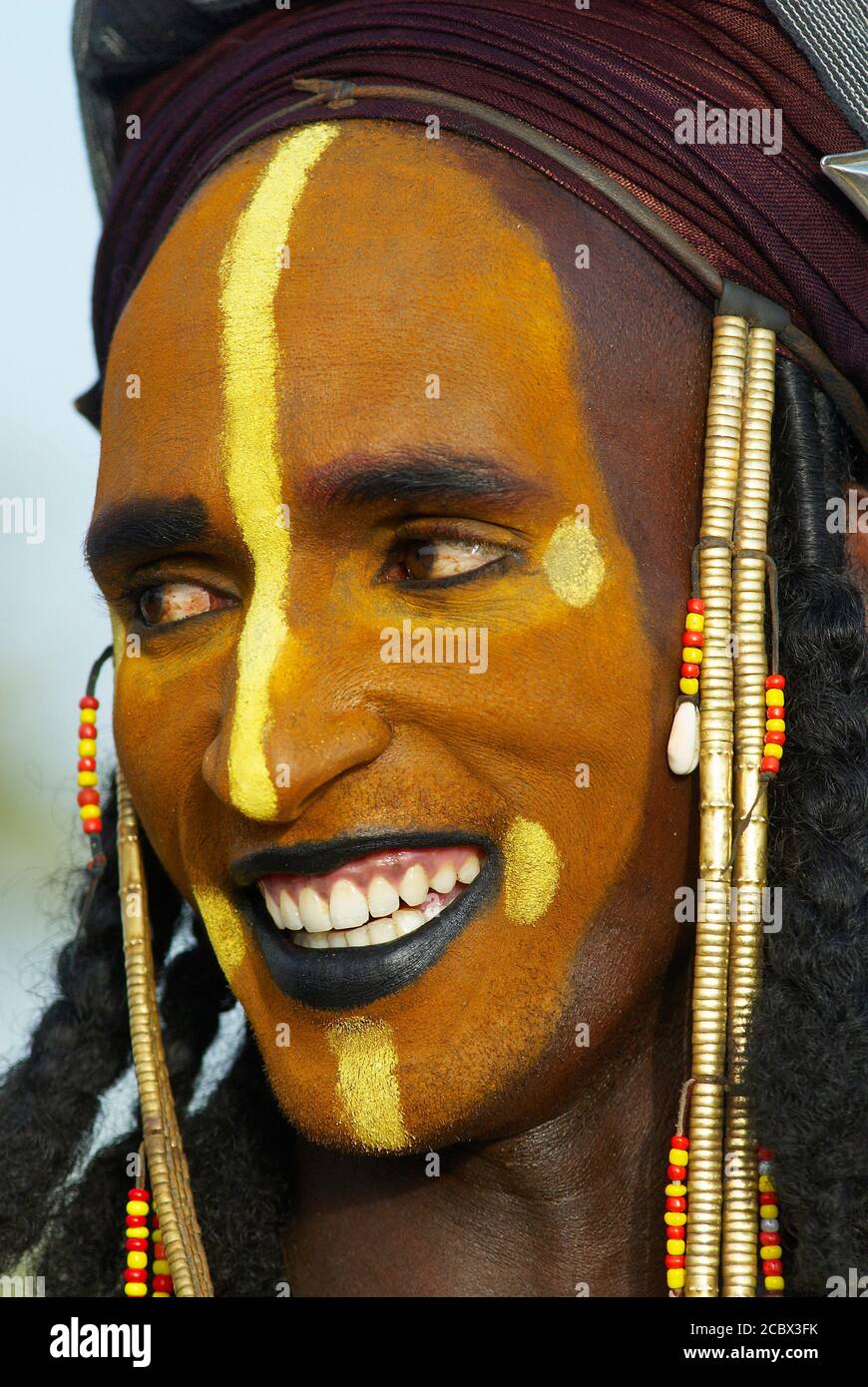 Niger. A Wodaabe-Bororo man with his face painted for the annual ...