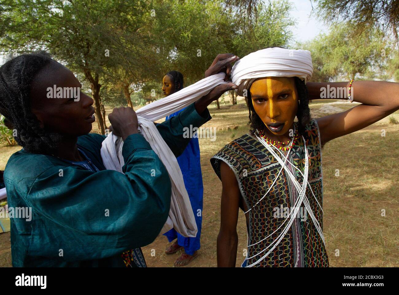 Niger. A Wodaabe-Bororo man with his face painted for the annual ...