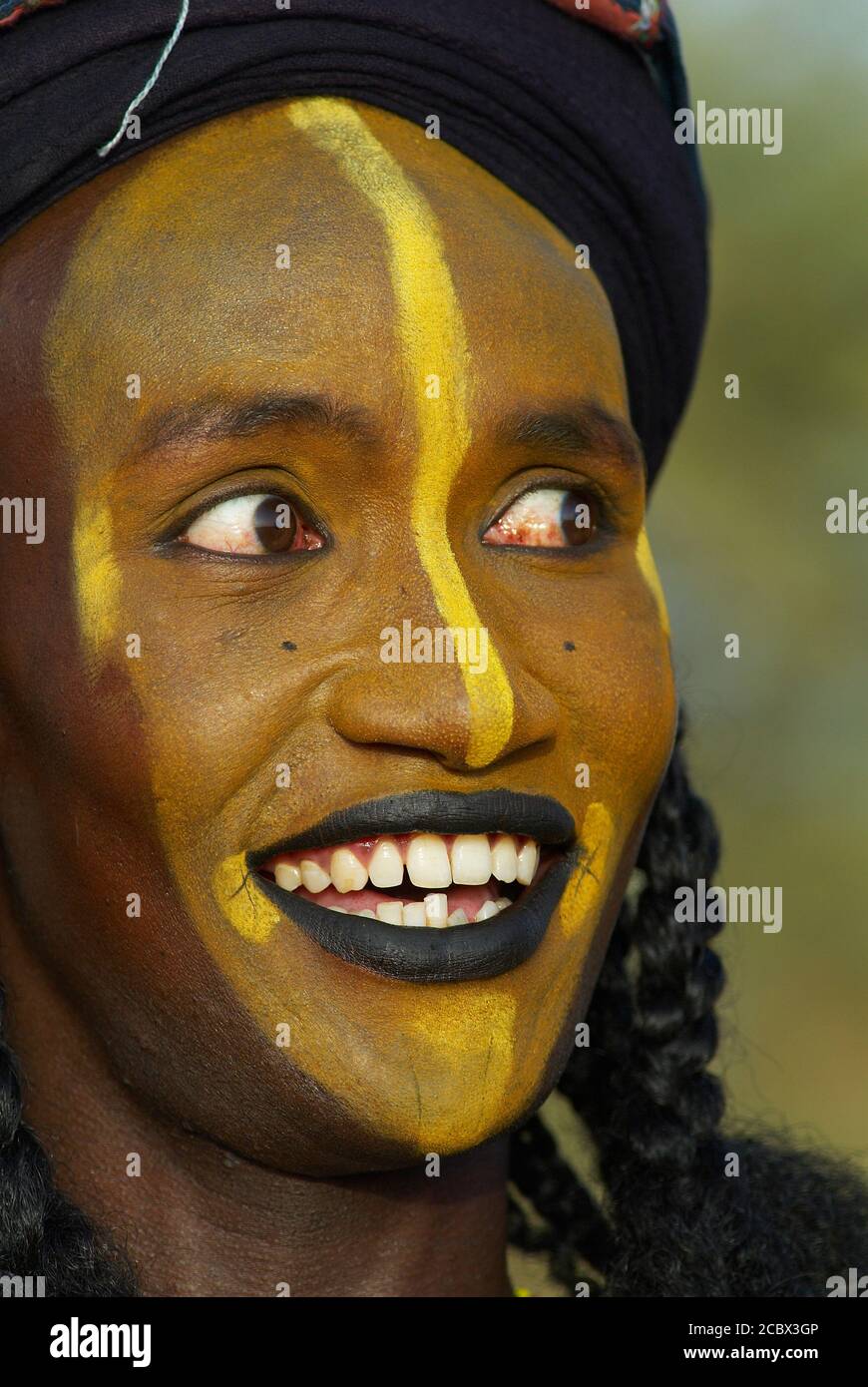 Niger. A Wodaabe-Bororo man with his face painted for the annual ...