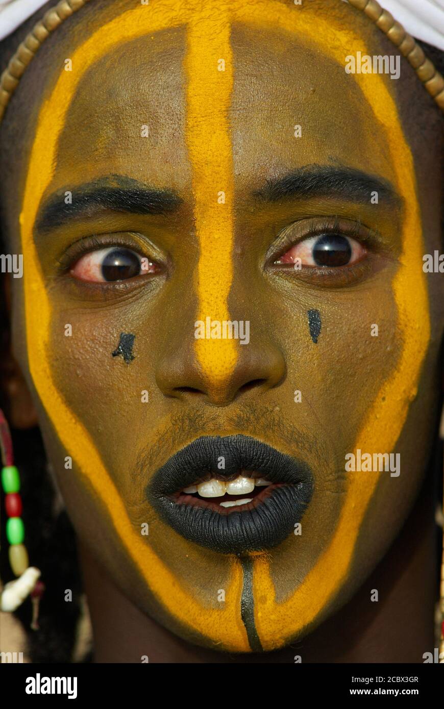 Niger. A Wodaabe-Bororo man with his face painted for the annual ...