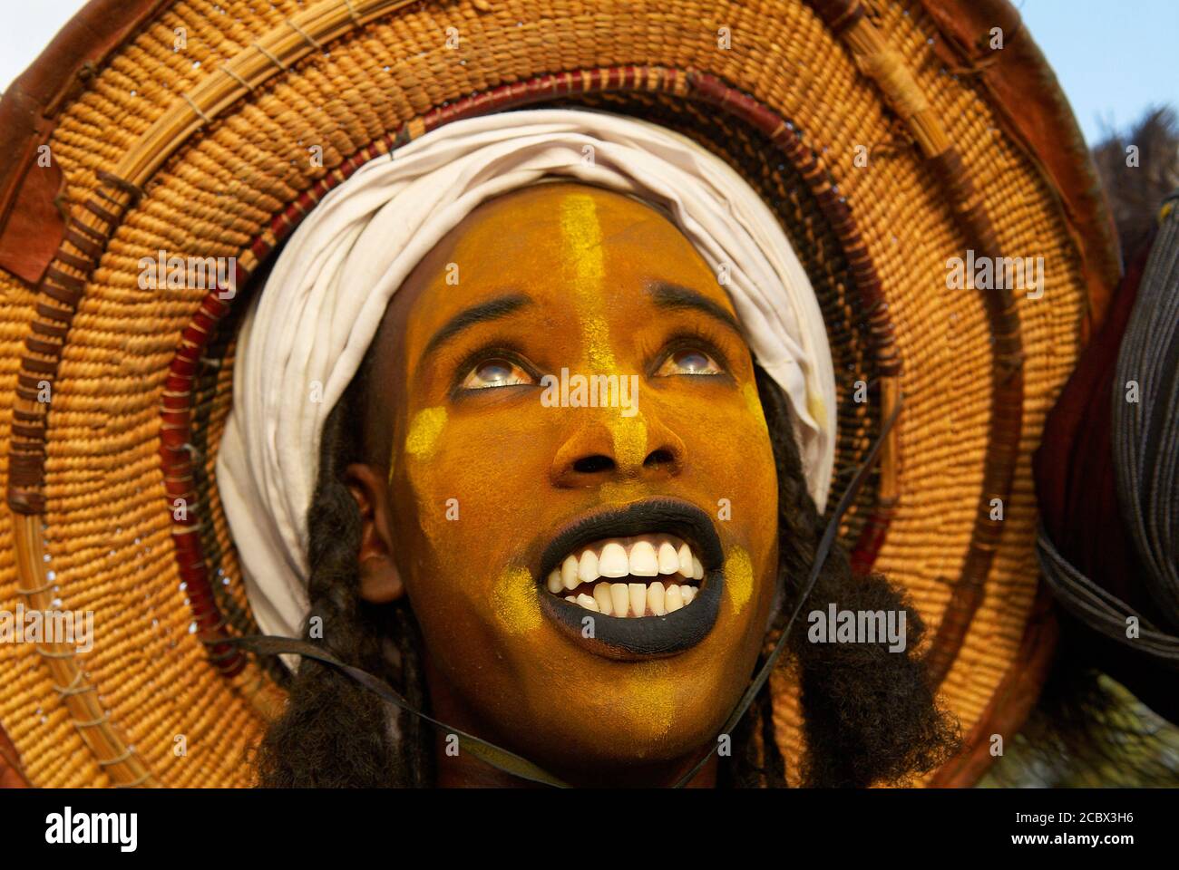Niger. A Wodaabe-Bororo man with his face painted for the annual ...