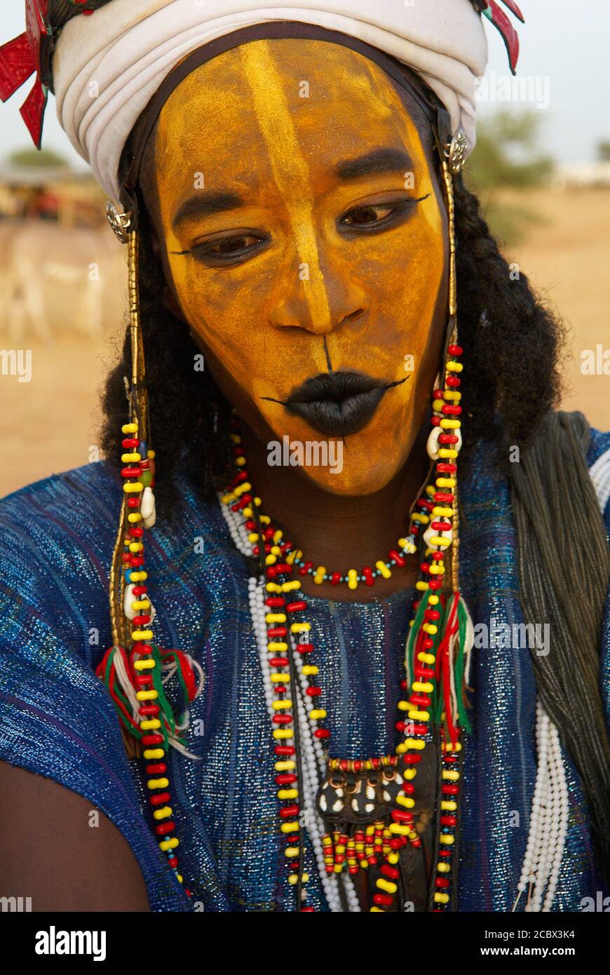 Niger. A Wodaabe-Bororo man with his face painted for the annual ...