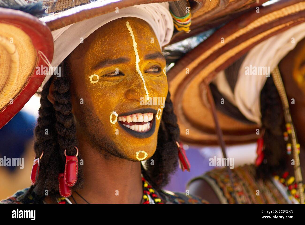 Niger. A Wodaabe-Bororo man with his face painted for the annual ...