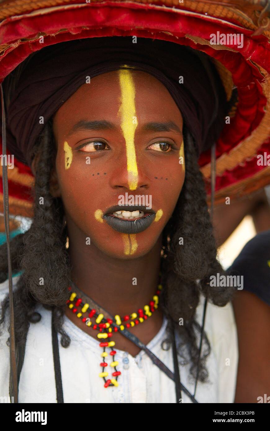 Niger. A Wodaabe-Bororo man with his face painted for the annual ...