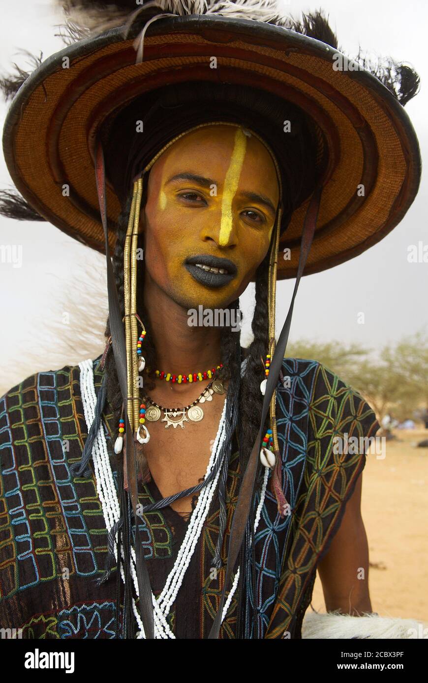 Niger. A Wodaabe-Bororo man with his face painted for the annual ...