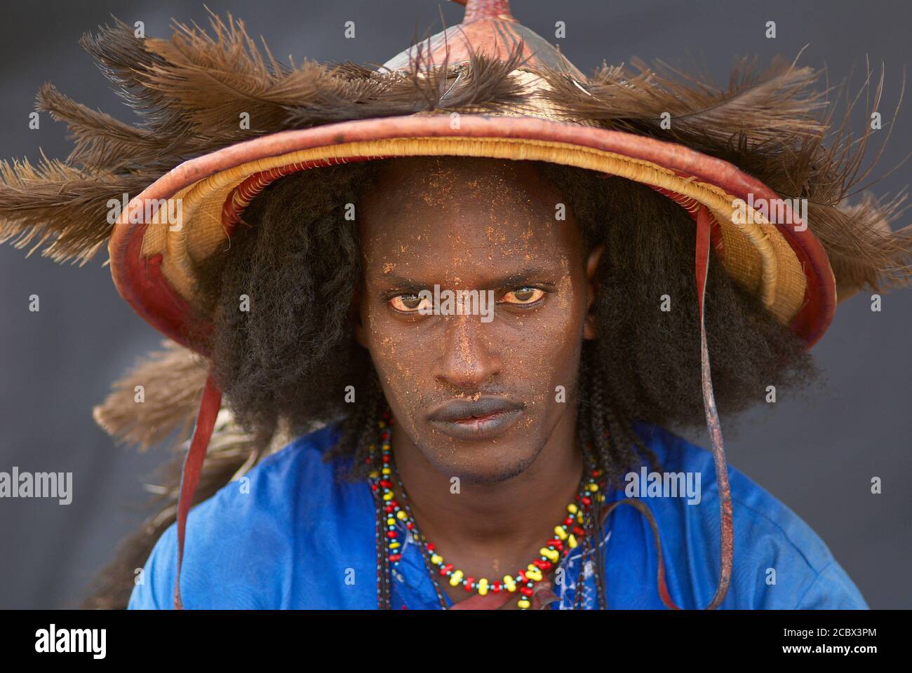 Niger. A Wodaabe-Bororo man with his face painted for the annual ...