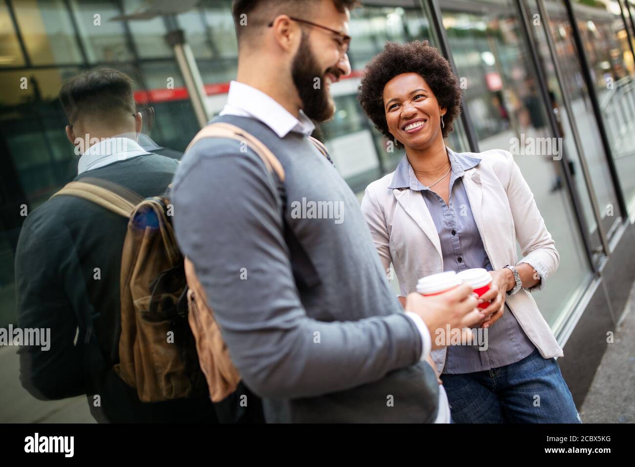Happy business people, students having fun, smiling, talking in the ...
