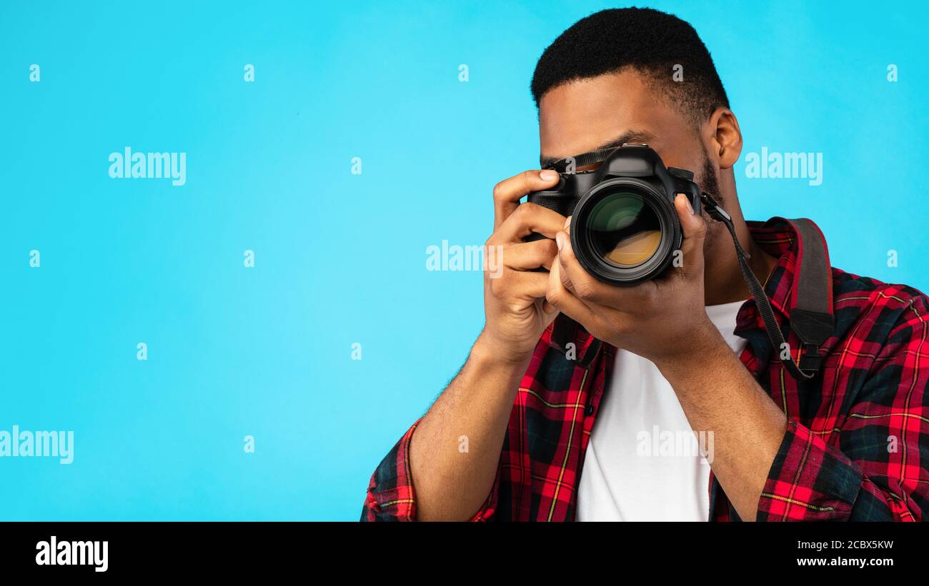 Professional Photographer Holding Modern Camera Taking Photo Standing ...