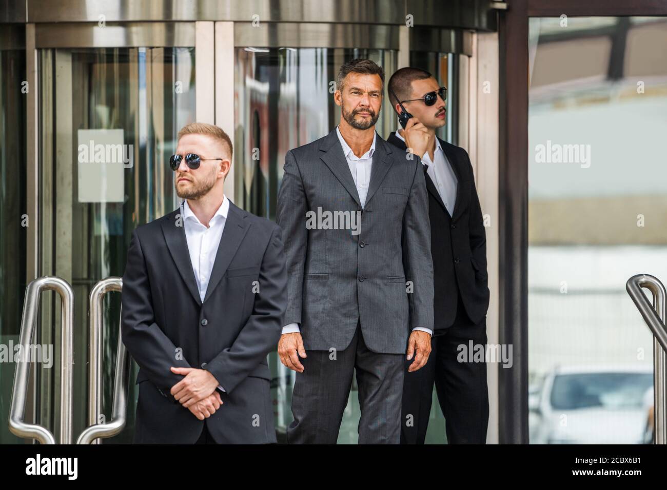 Security Guard Service Protecting Business Man Outside Stock Photo - Alamy