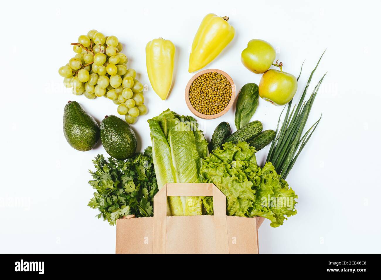 Healthy diet grocery shopping package with fresh vegetables, herbs ...