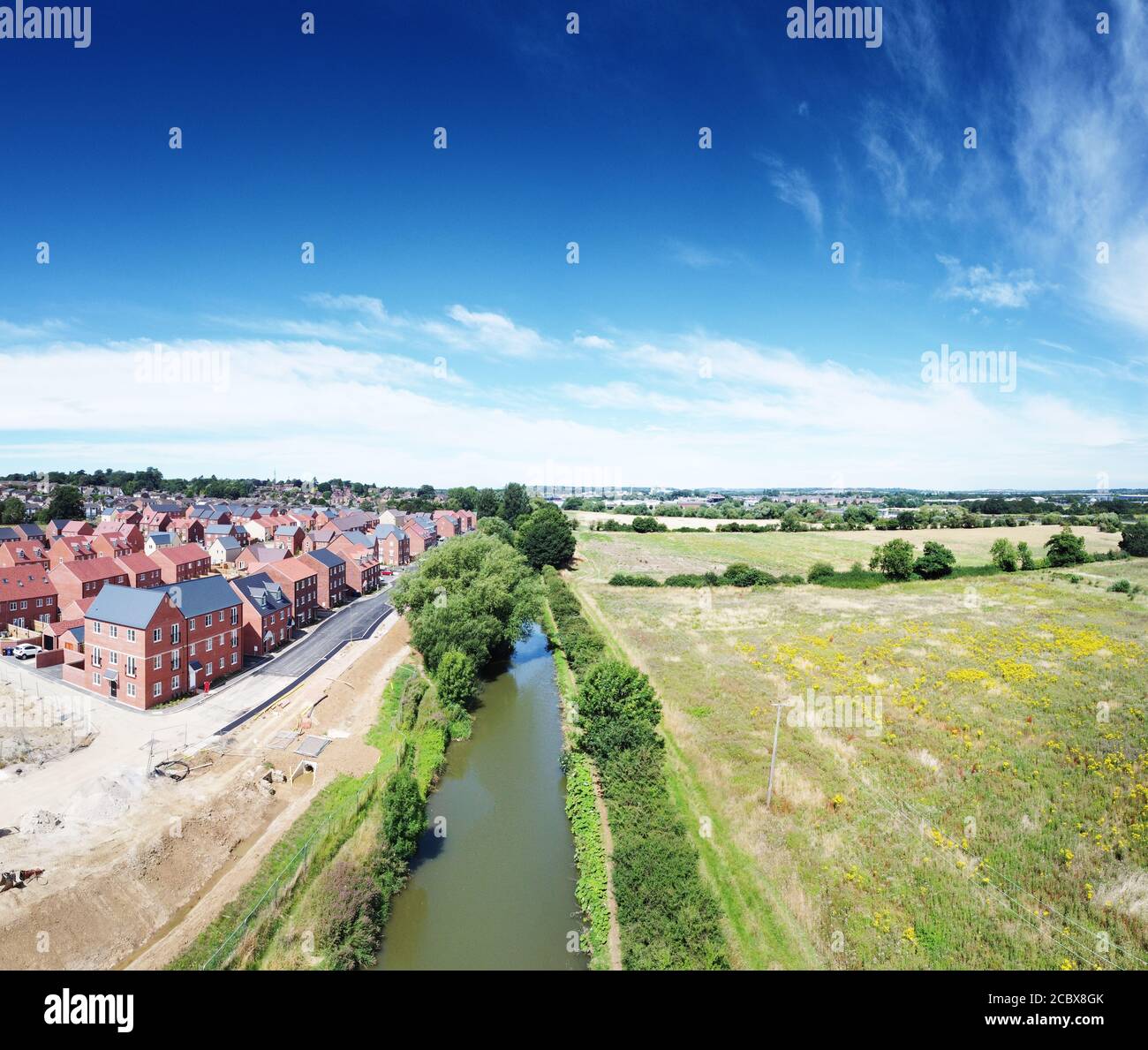 aerial view of new housing estate in Bodicote with the canal along side ...