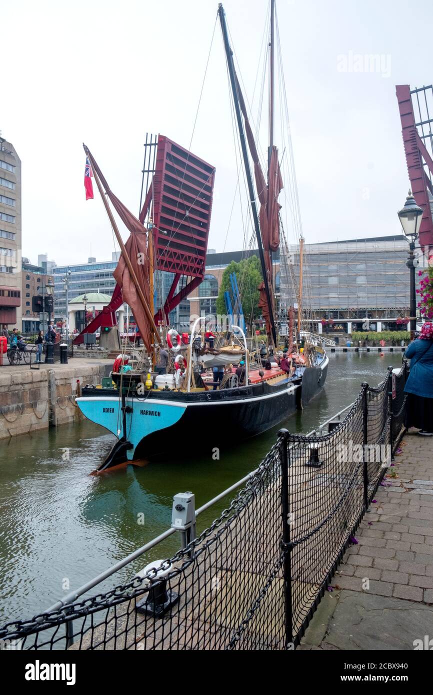 A barge passes the lifting Bridge from St Katherine's Dock into the ...