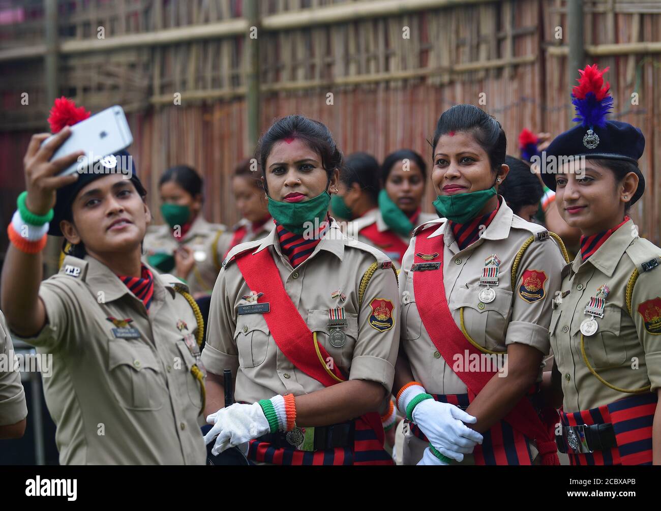 Police and other paramilitary personnel are capturing photographs and ...