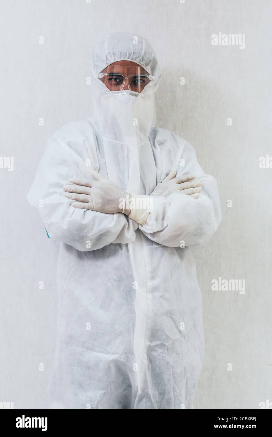 Doctor in PPE suit , face mask and face shield in hospital ward Stock ...