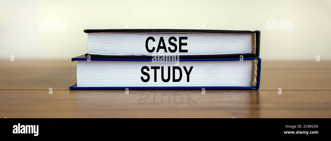 Books with text 'case study' on beautiful wooden table. White ...
