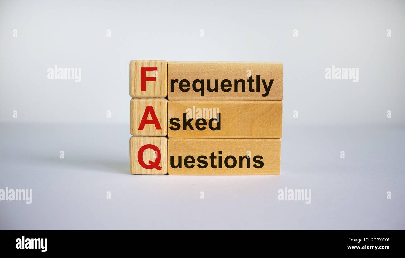 Concept words 'FAQ, frequently asked questions' on cubes and blocks on ...