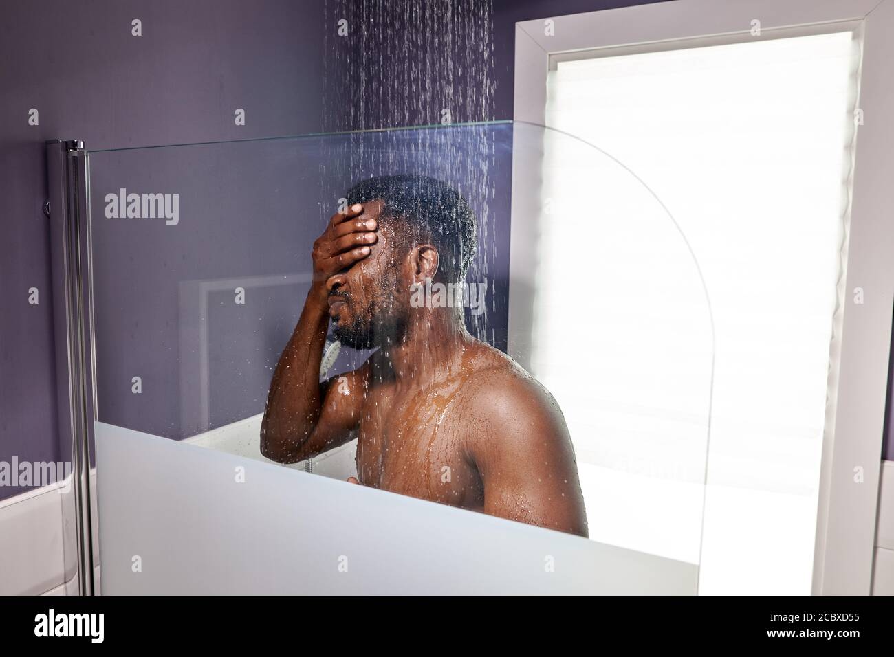 Man in shower sad hi-res stock photography and images - Alamy
