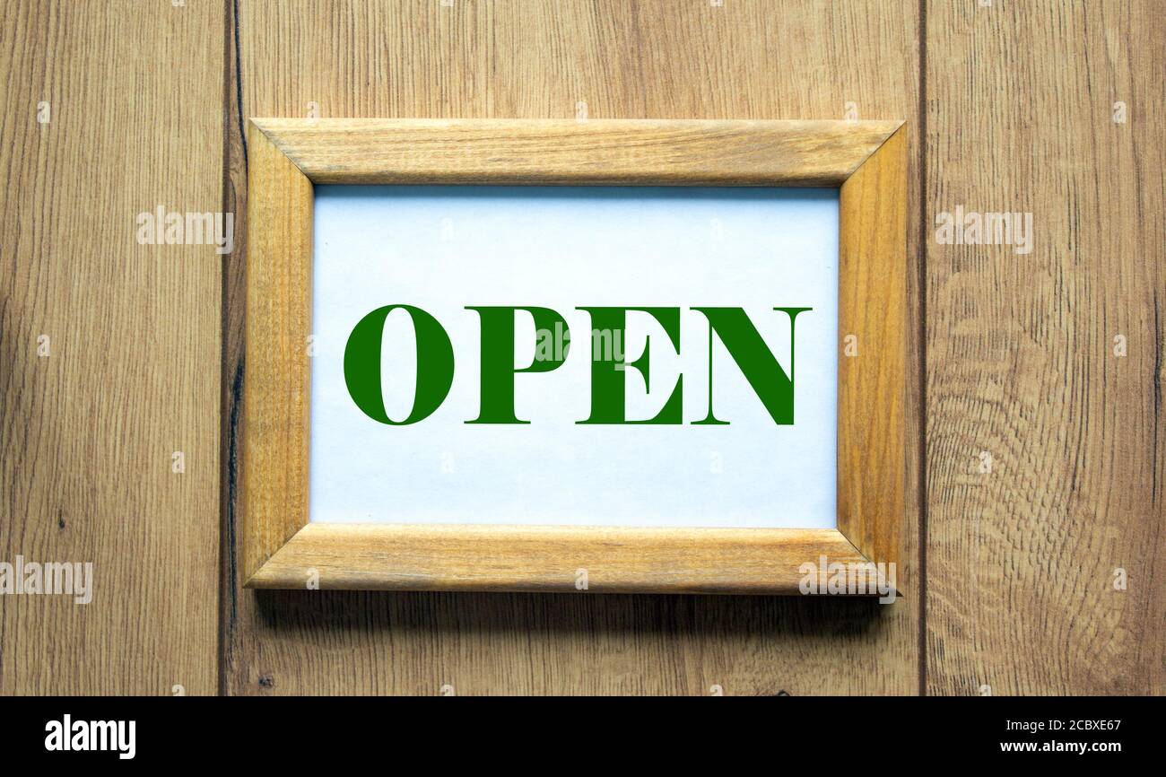Wooden picture frame with inscription 'open' on beautiful wooden ...