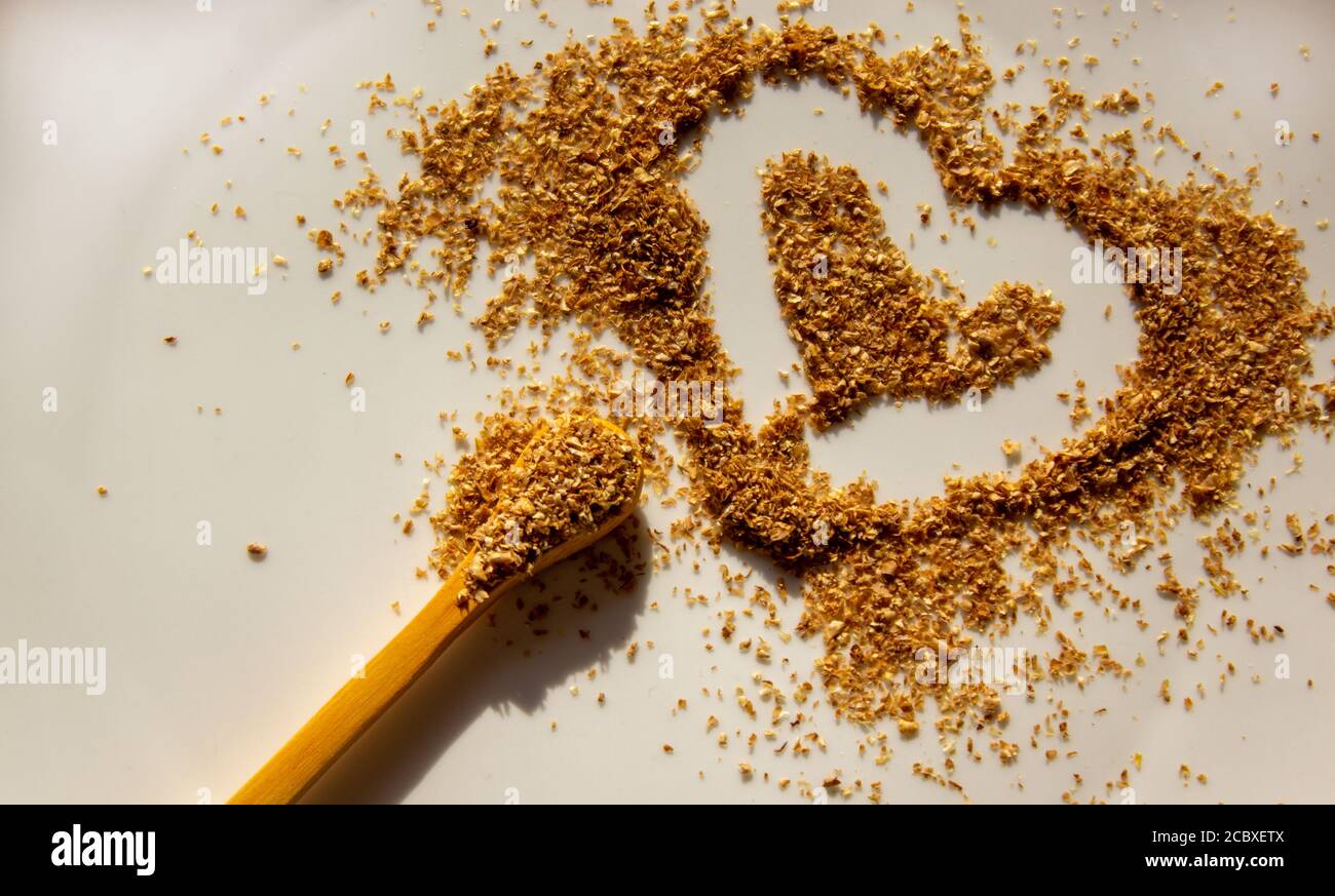 Wooden spoon and spicy composition isolated over the white background ...
