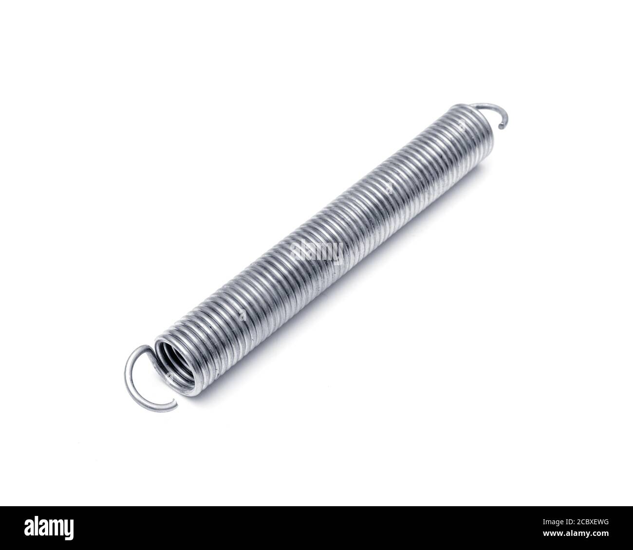 Steel compression spring on white Stock Photo - Alamy