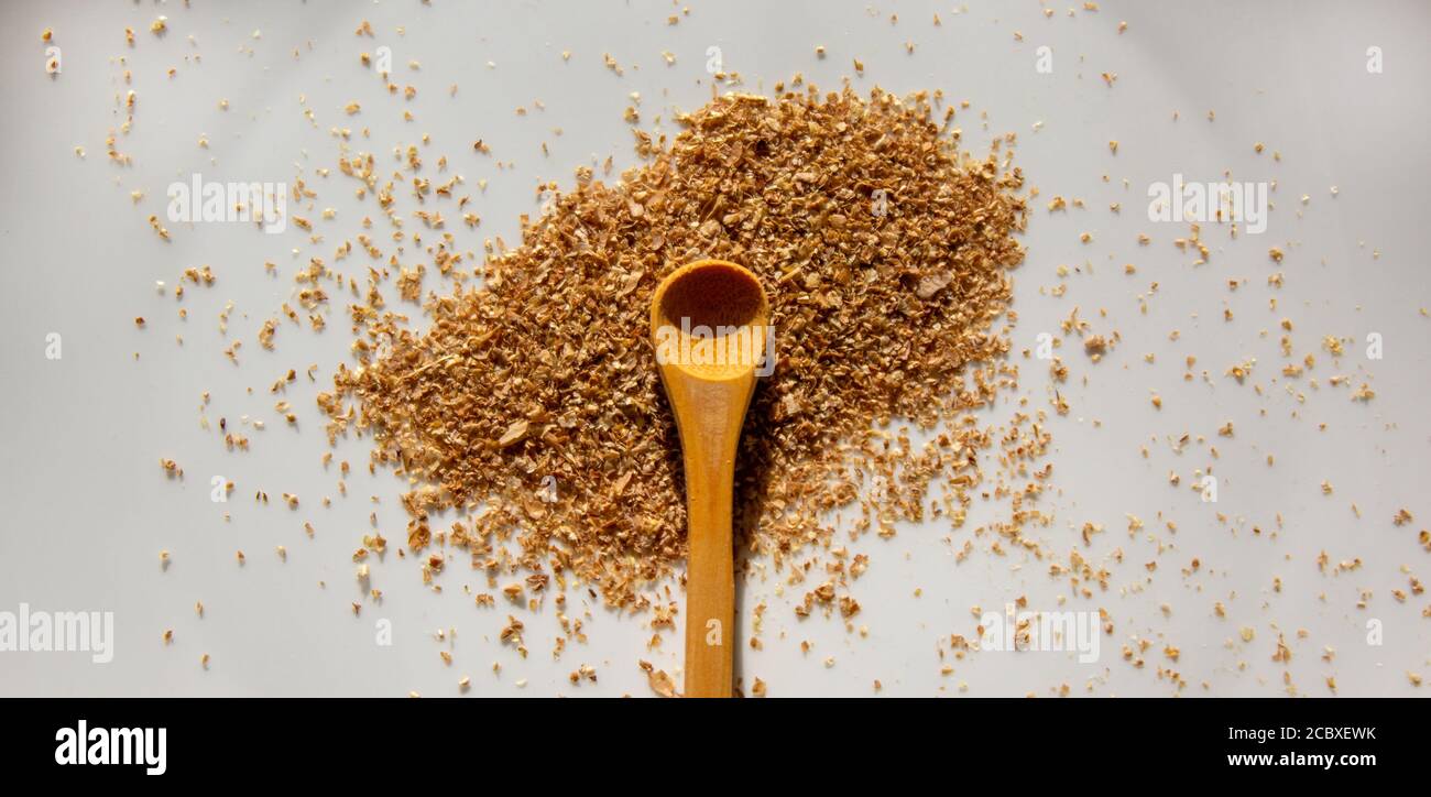 Wooden spoon and spicy composition isolated over the white background ...