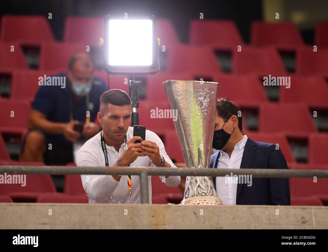 Lukas podolski takes pictures uefa cup hi-res stock photography and ...