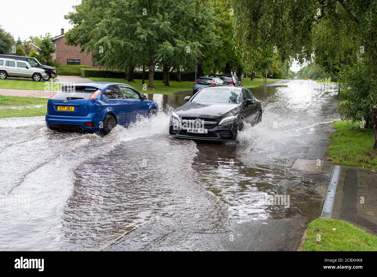A car driving through flood water hi-res stock photography and images ...