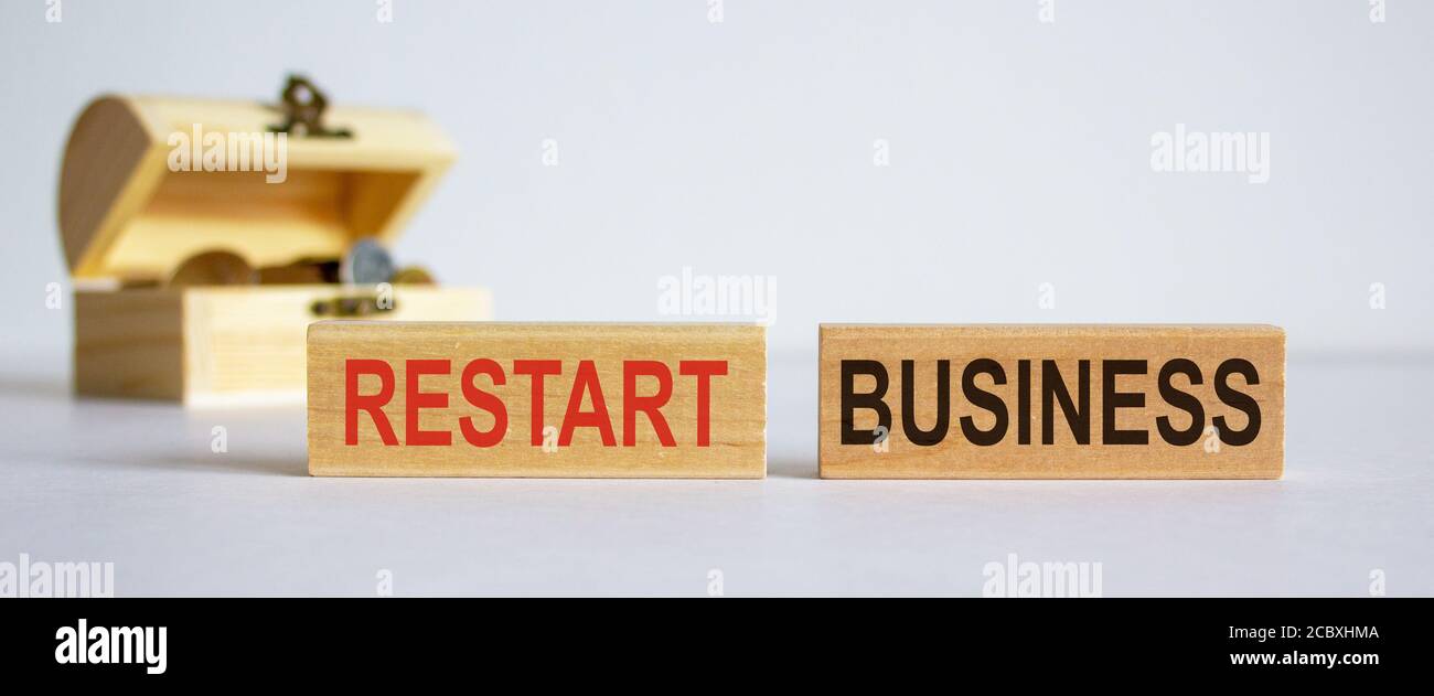 Concept words 'restart business' on blocks on a beautiful white ...