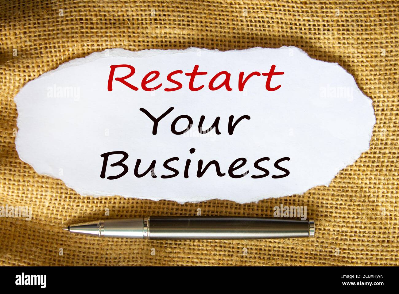 The text 'restart your business' on white paper. Metalic pen. Beautiful ...