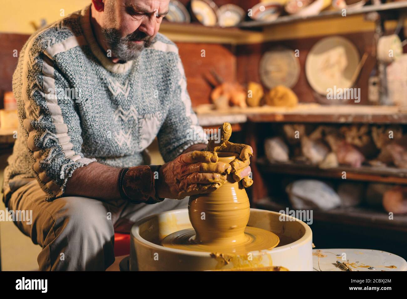 Man modeling clay hi-res stock photography and images - Alamy