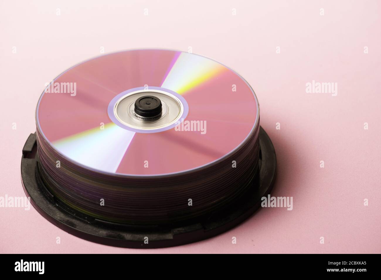 cd rooms or dvd tower on pink background Product photography. flat lay ...
