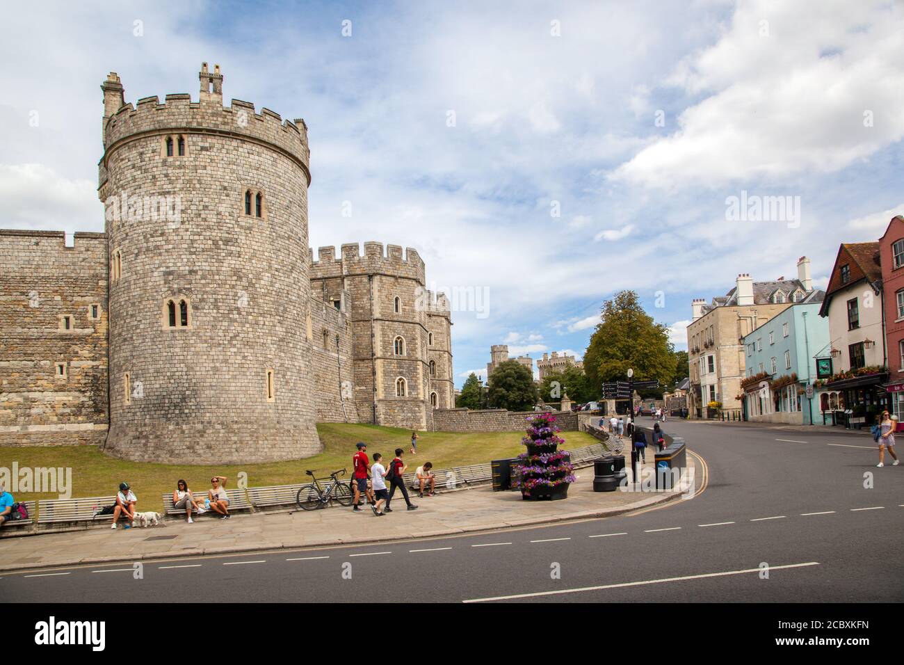 Tourists visitors and day tippers take in the view of Windsor Castle ...