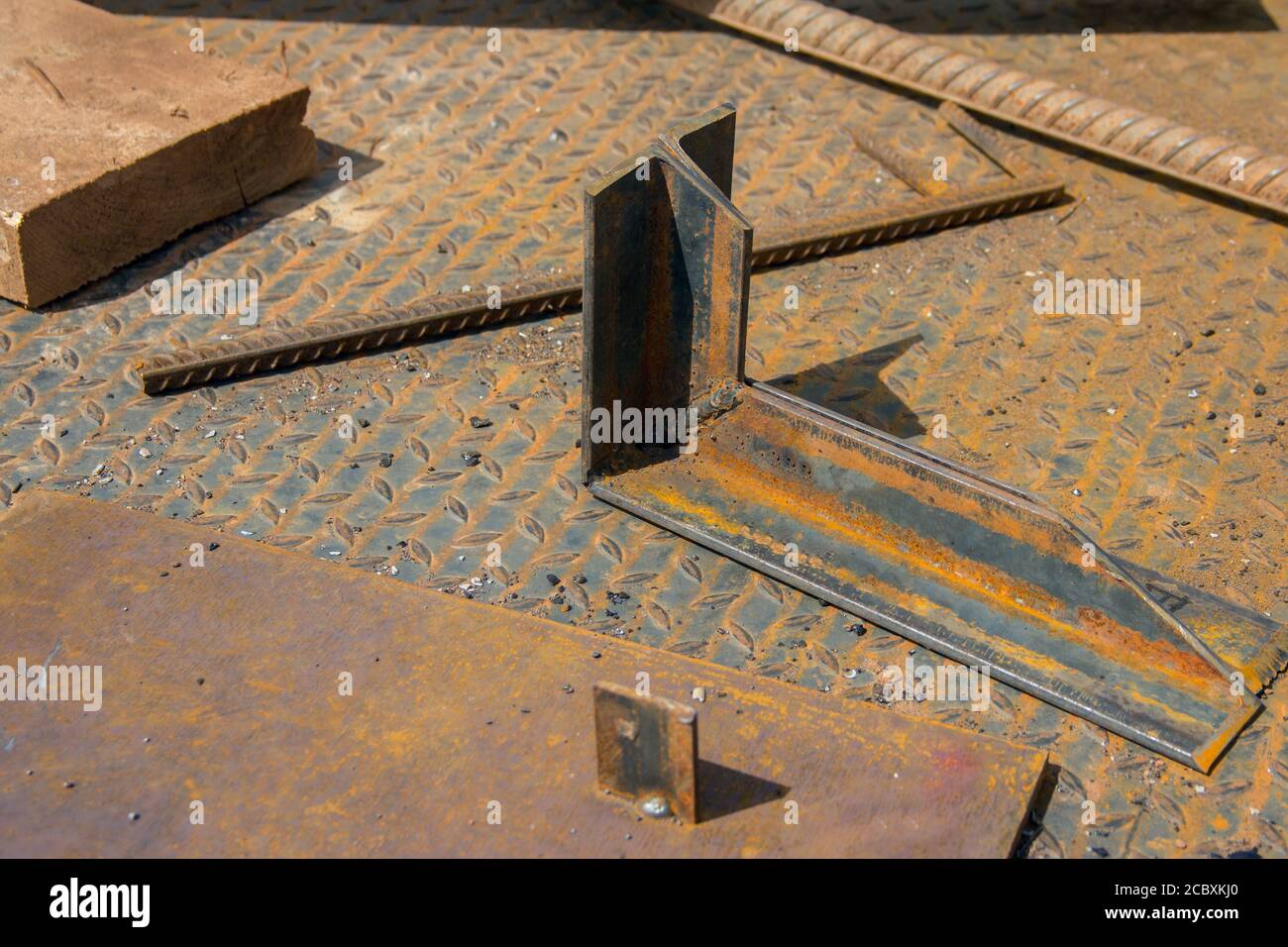 Welded Metal details. A blank steel part. Welding work at a ...