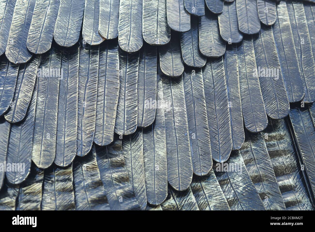 Closeup background of metal feathers texture Stock Photo - Alamy