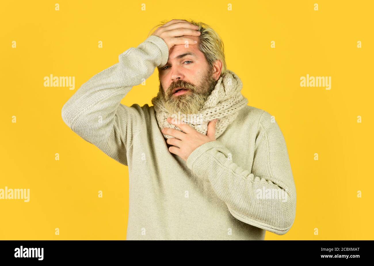 Immune response Bearded man sick. Warm scarf around neck. More than ...