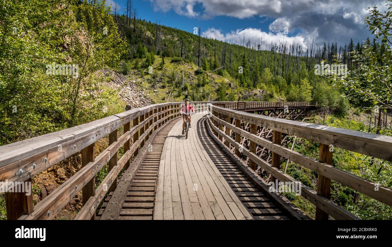 Biking over the Wooden Trestle Bridges of the abandoned Kettle Valley ...