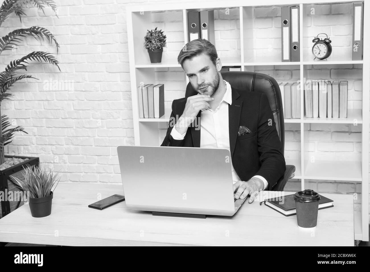 Surfing for business information. Businessman do business online ...