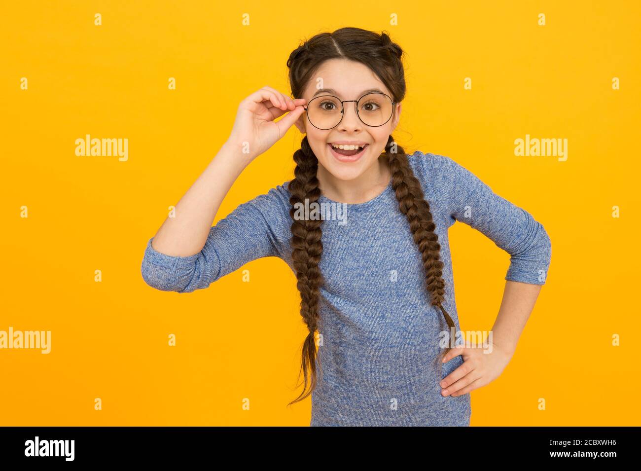 Show your smile and be positive. Happy child smile in glasses yellow ...