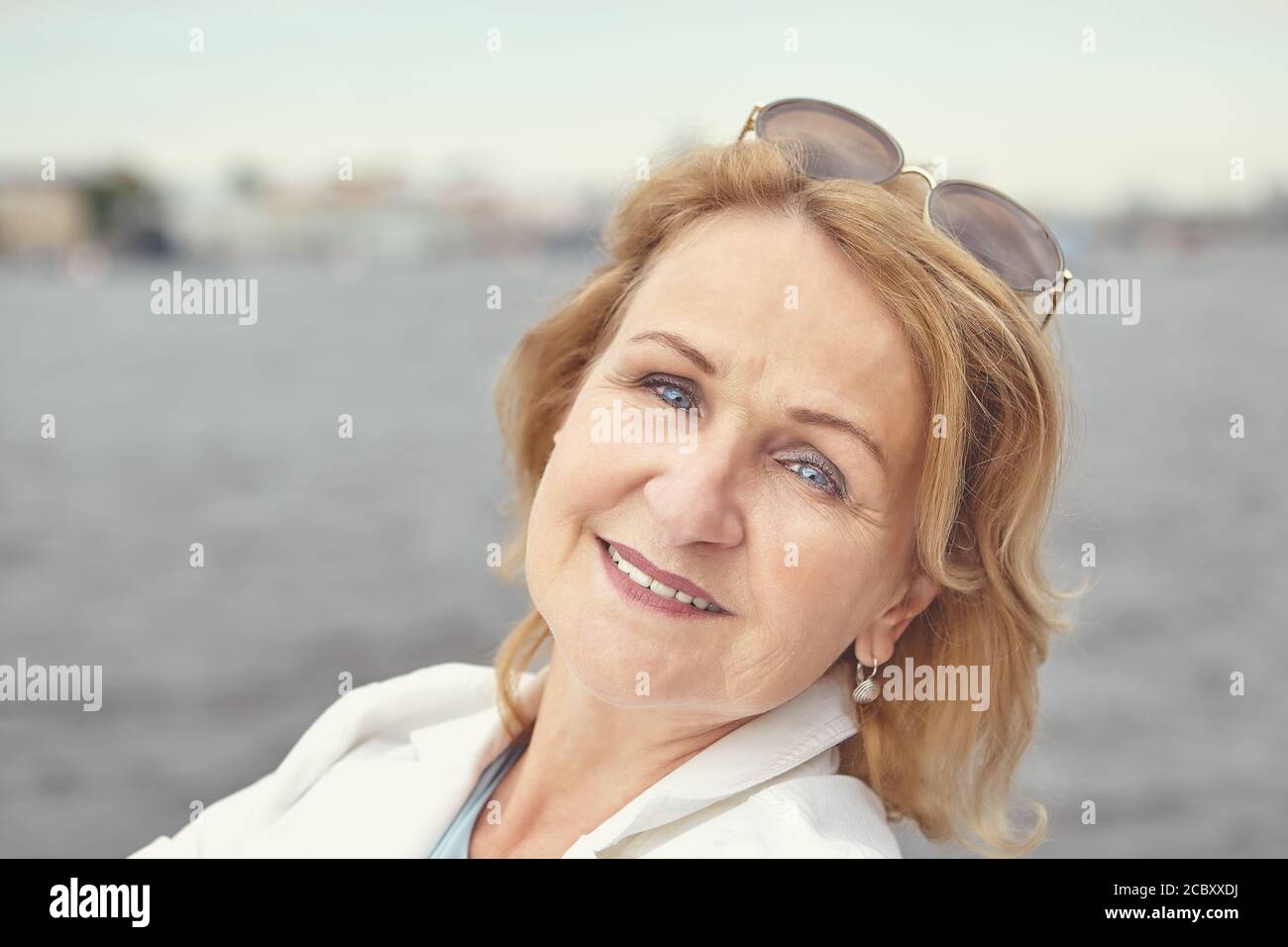 Beautiful active caucasian senior woman about 62 years old with blond ...
