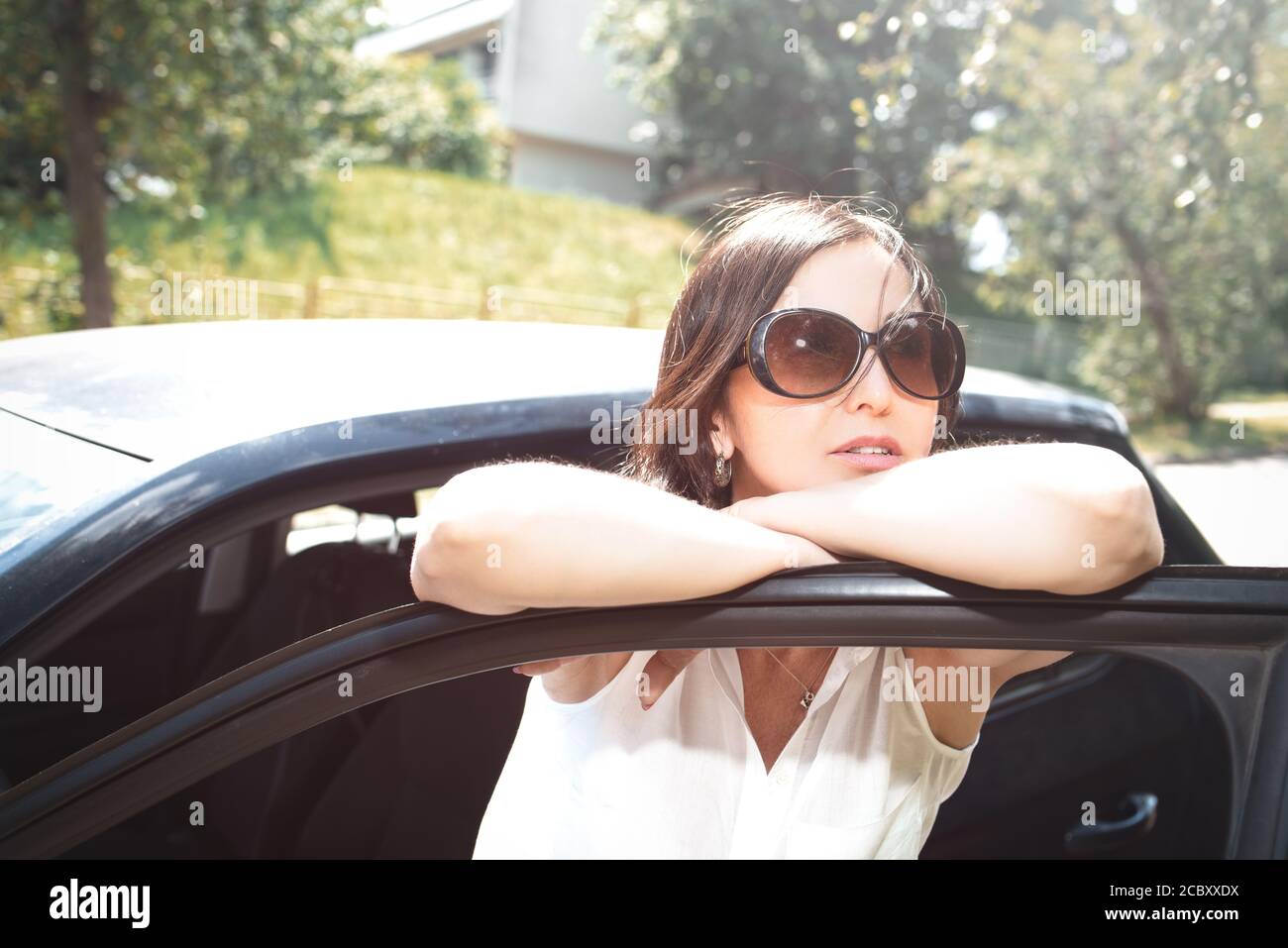 Driver smile car window hi-res stock photography and images - Alamy