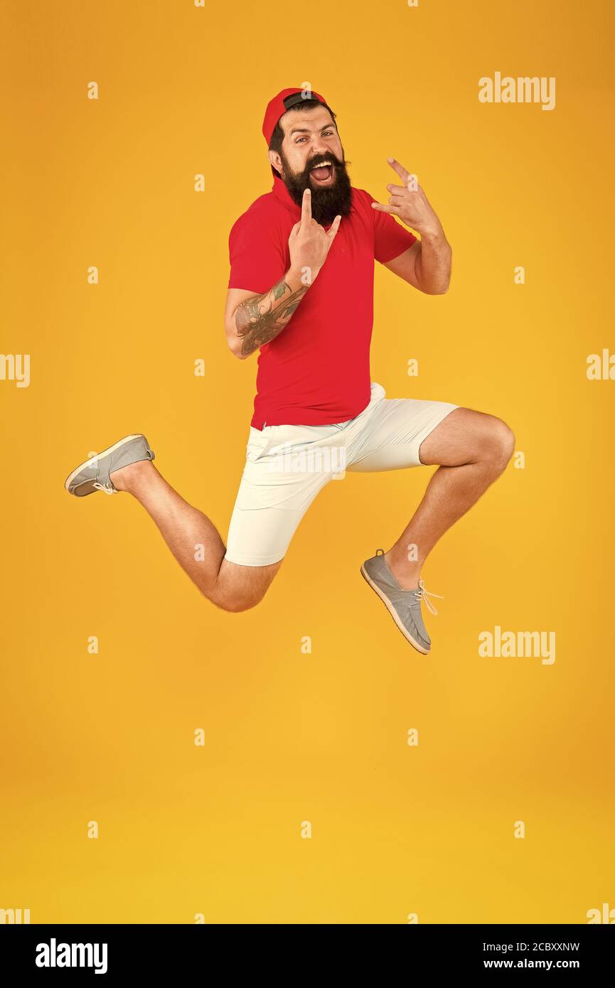 excited bearded man jumping. full of energy. Impetuous movement ...