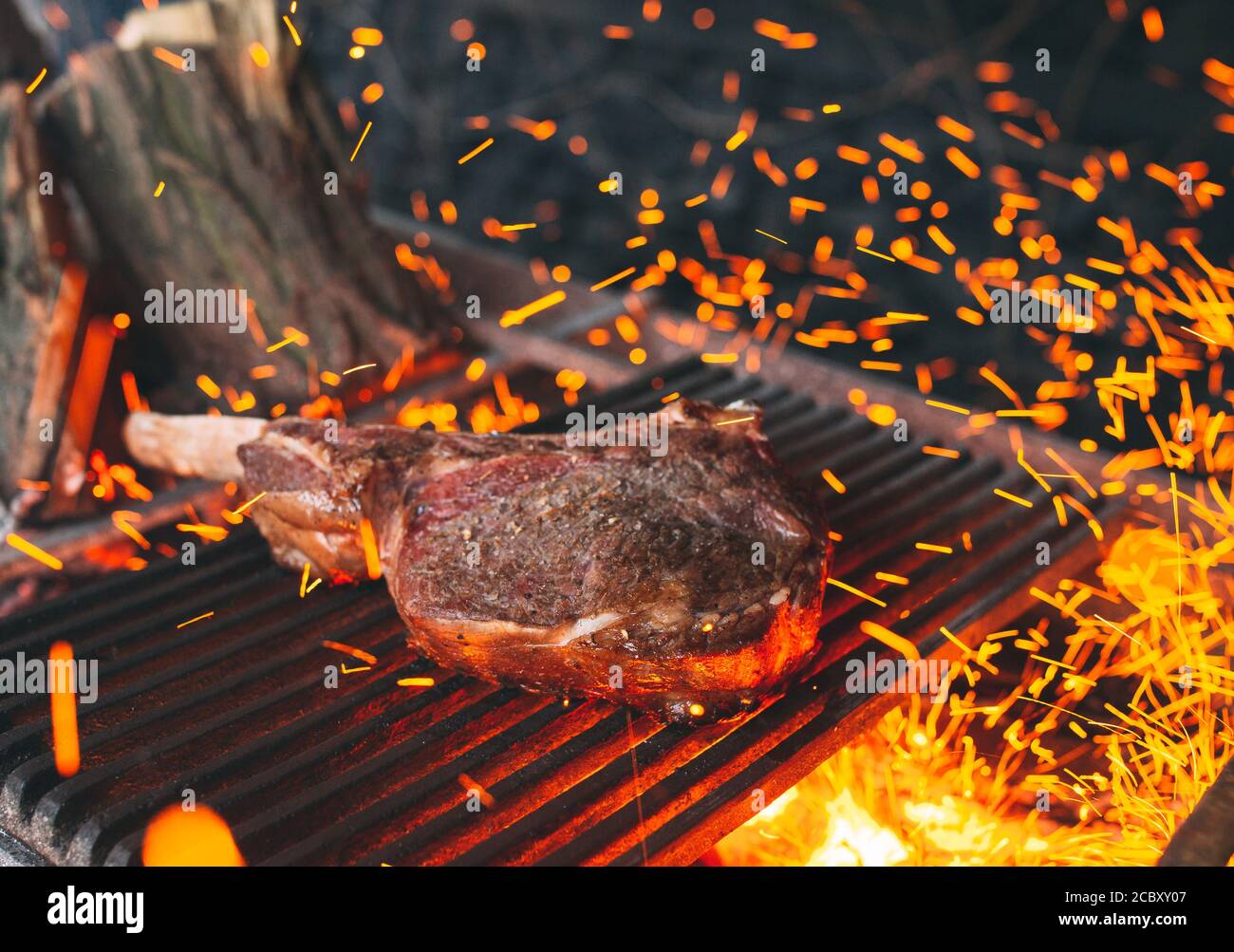Beef steak is cooked on fire. Beef Rib BBQ Stock Photo - Alamy