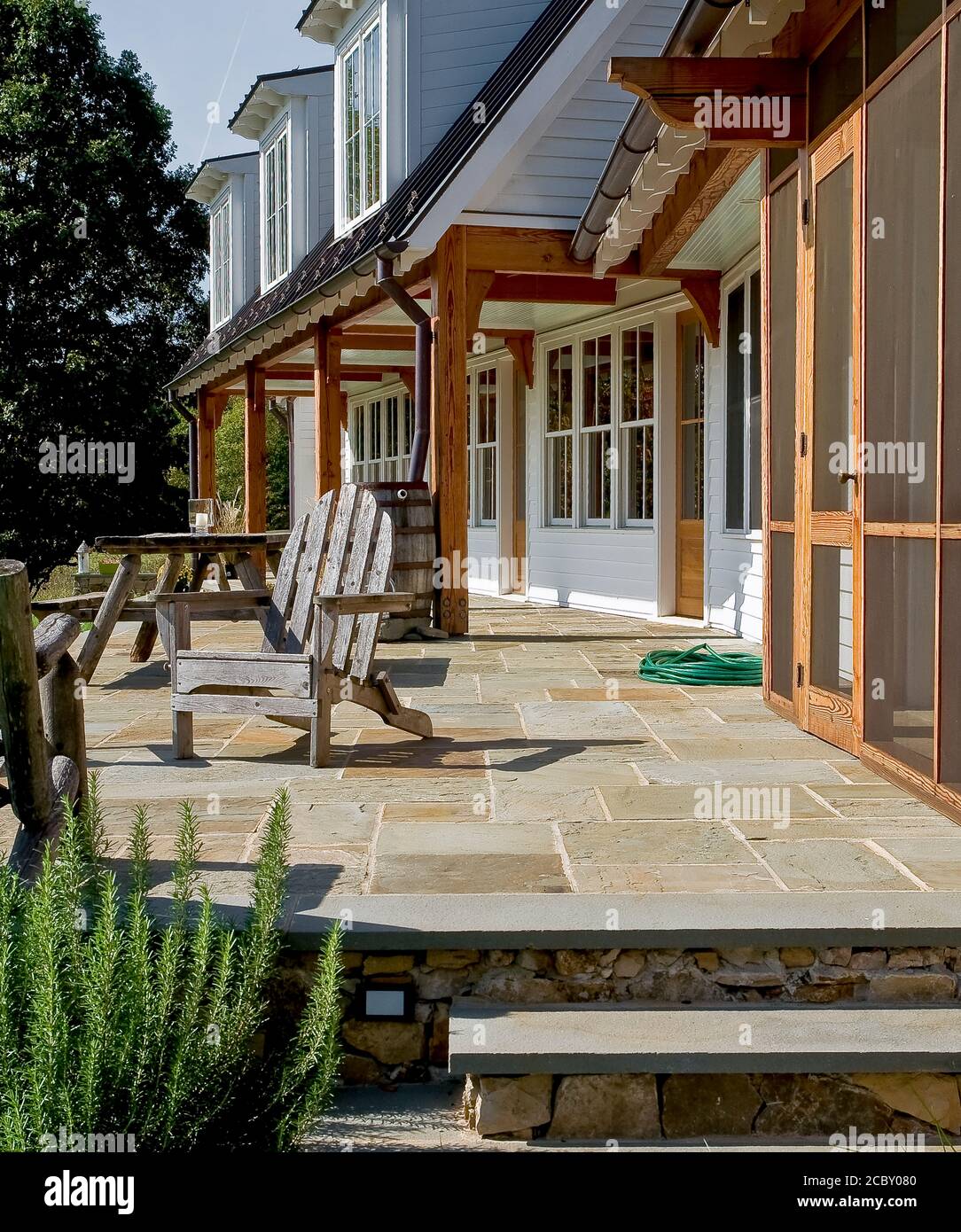 Enclosed Farmhouse Porch Stock Photo - Alamy